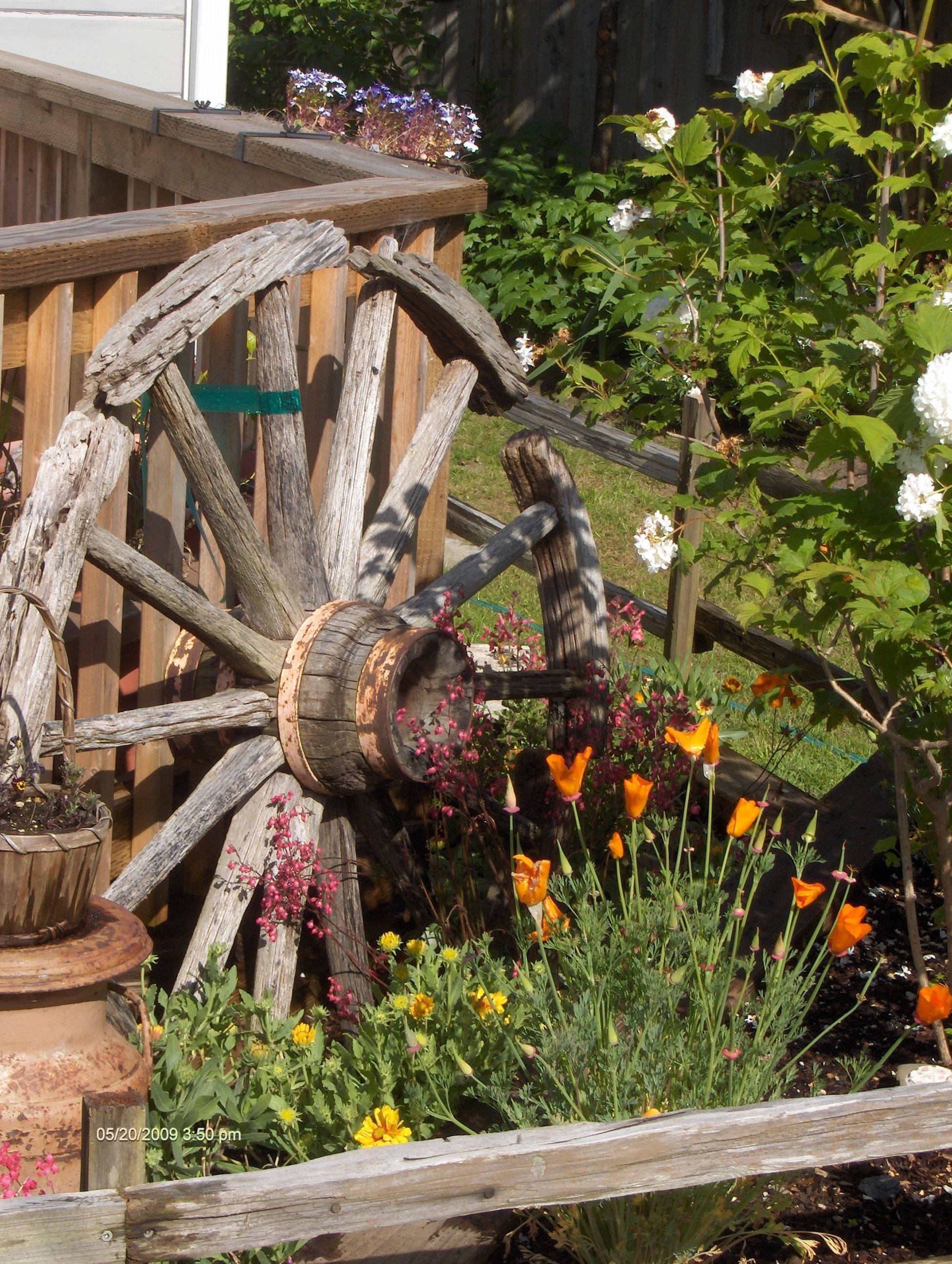 22 Garden Wagon Wheels Decor Ideas To Try This Year | SharonSable