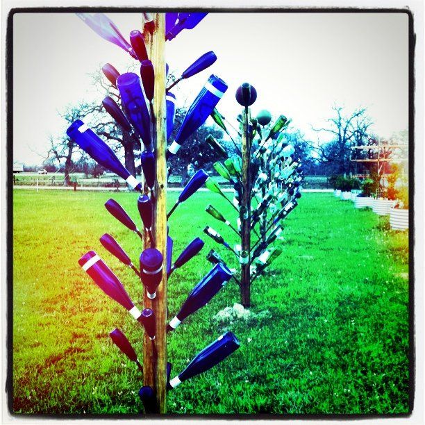 21 Garden Bottle Tree Ideas To Try This Year | SharonSable