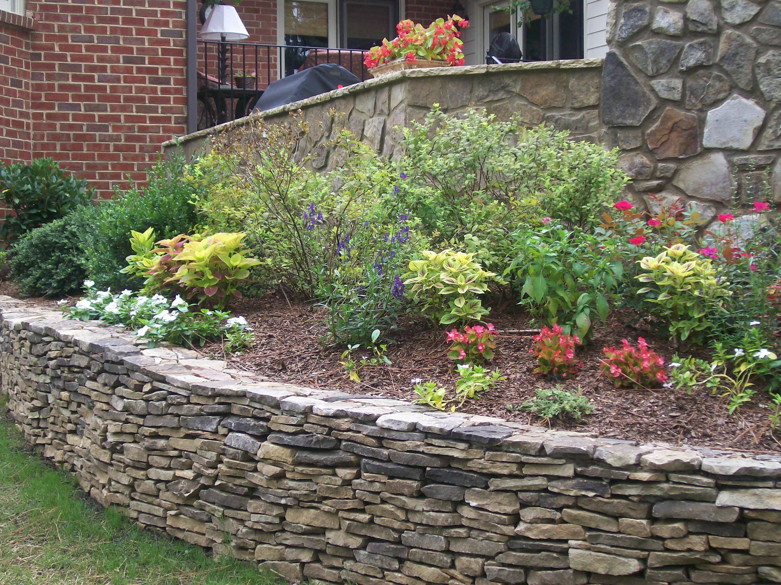 24 Stacked Stone Garden Wall Ideas Worth to Check | SharonSable