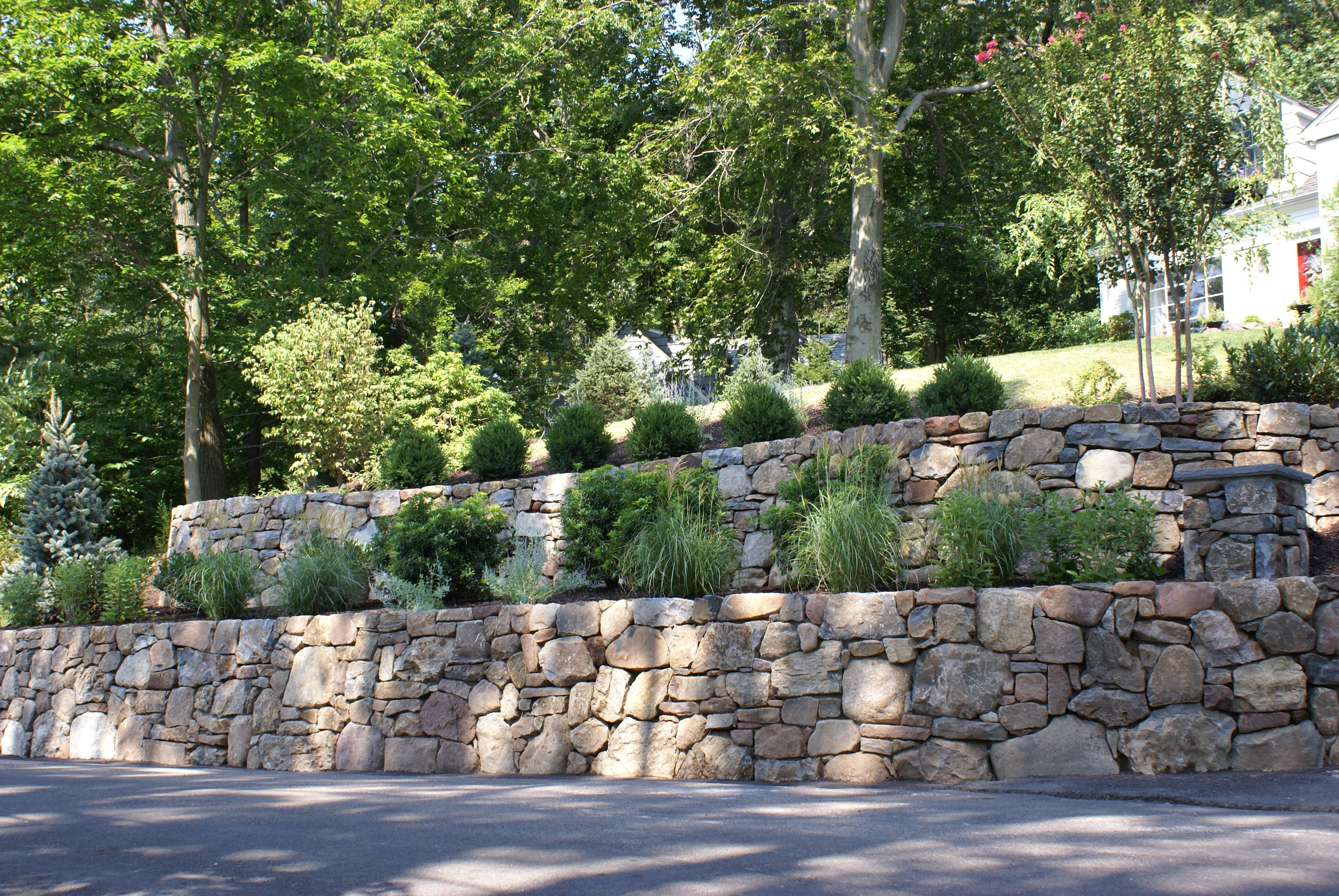 24 Stacked Stone Garden Wall Ideas Worth to Check | SharonSable