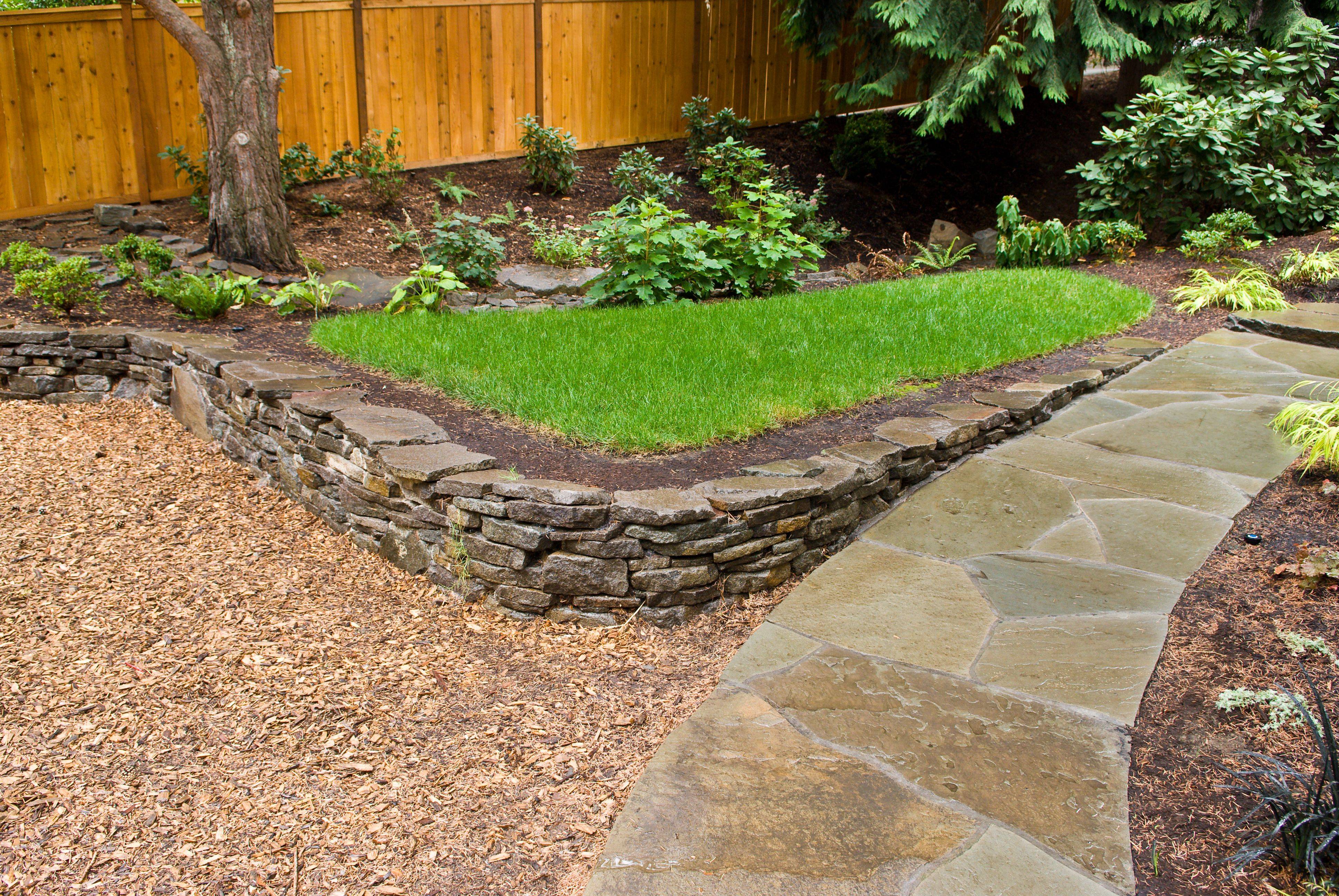 24 Stacked Stone Garden Wall Ideas Worth to Check | SharonSable